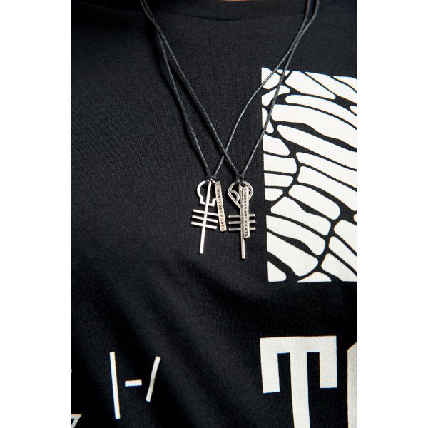 TWENTY ONE PILOTS GIVEAWAY: SKELETON & ALIEN NECKLACES | Strife Mag